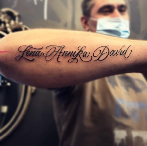 60 Best Arm Writing Tattoos For Boys & Girls - Tidy Tale